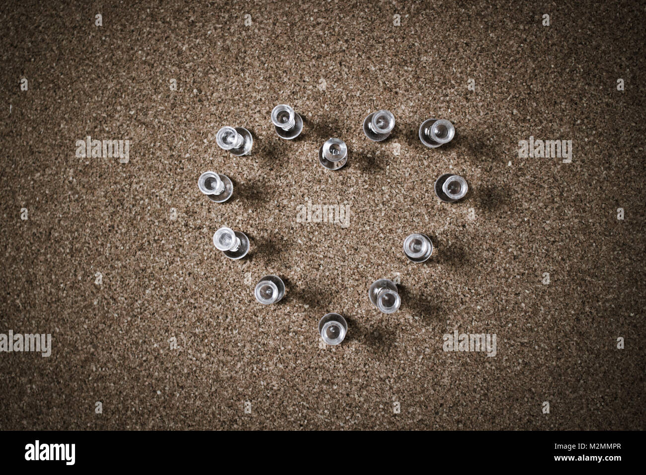 Heart. Heart of button on a brown background Stock Photo - Alamy