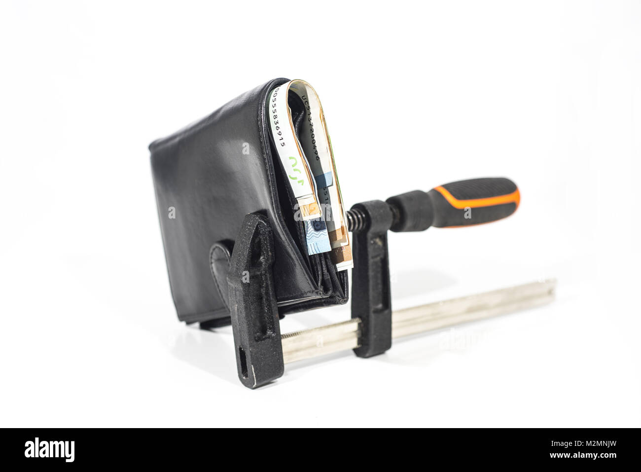 Abstract photo. Purse under clamp. Isolated on white background Stock ...