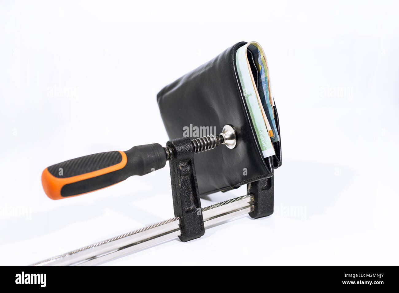 Abstract photo. Purse under clamp. Isolated on white background Stock ...