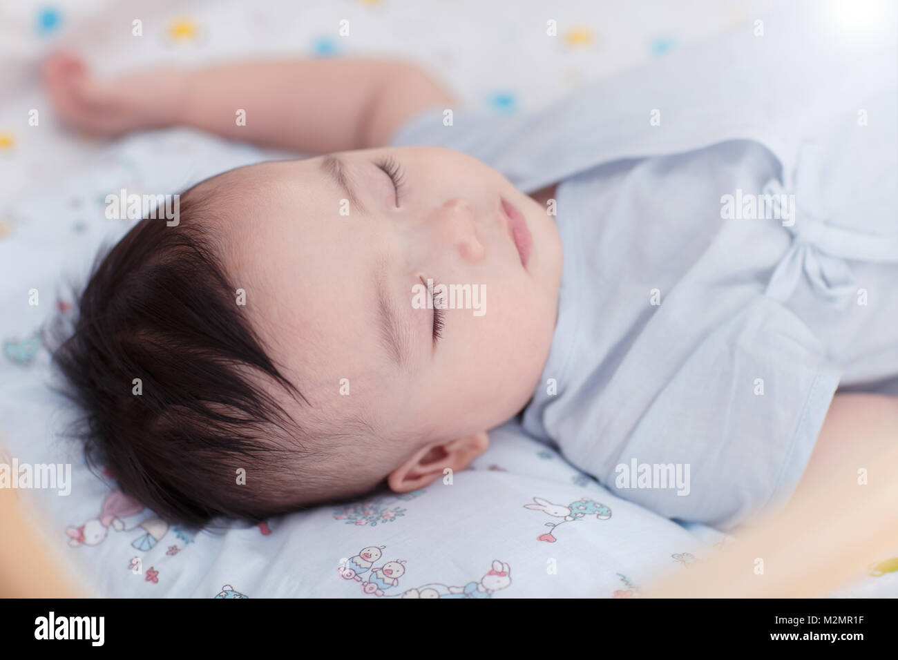 The male baby is sleeping Stock Photo - Alamy