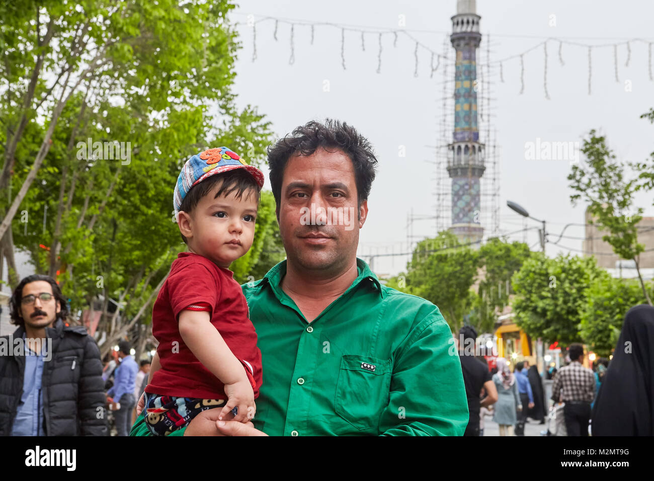 Tehran, Iran - April 27, 2017: an Iranian man with his little son in ...