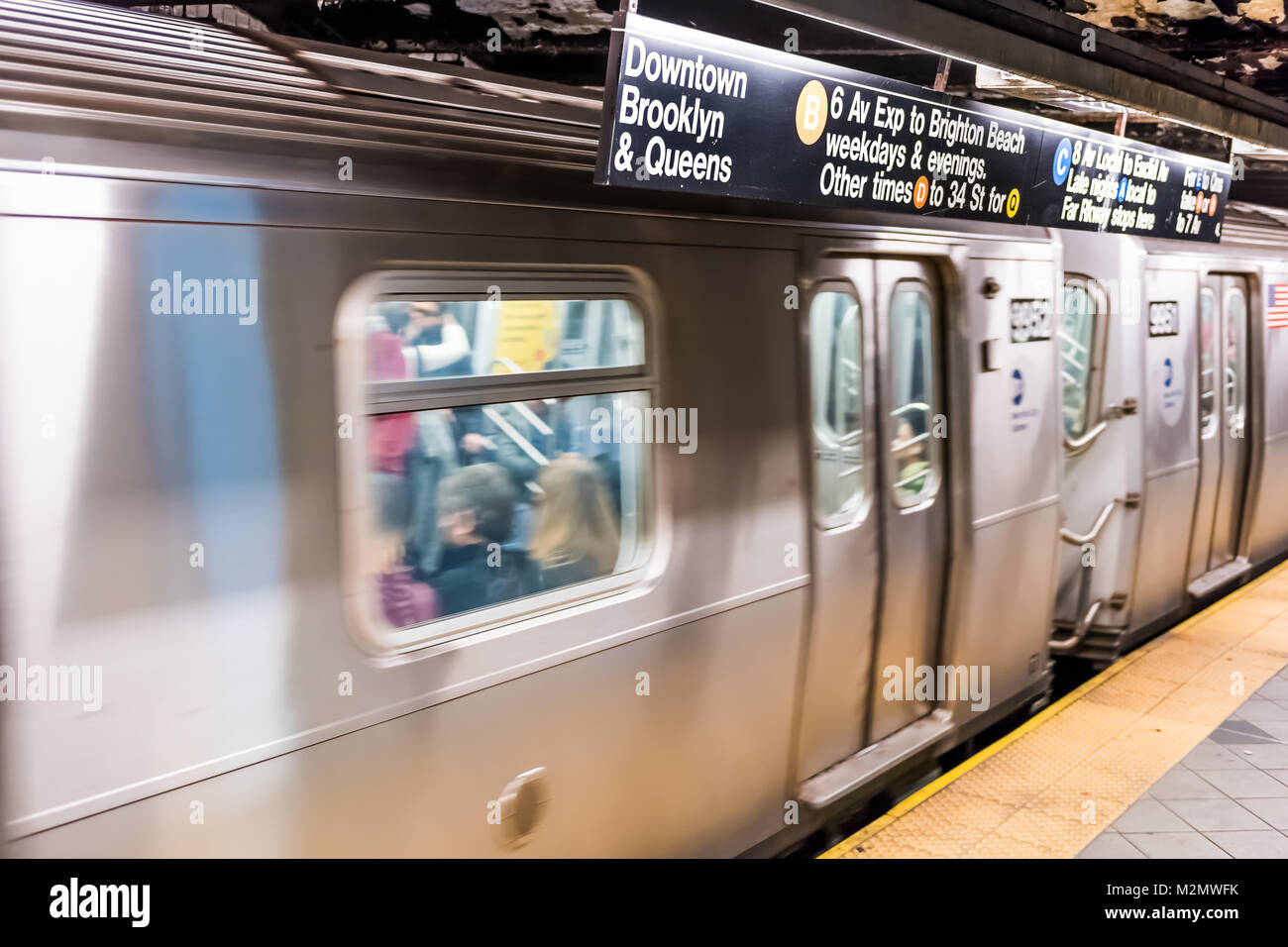 New York City, USA - October 28, 2017: People in underground platform ...