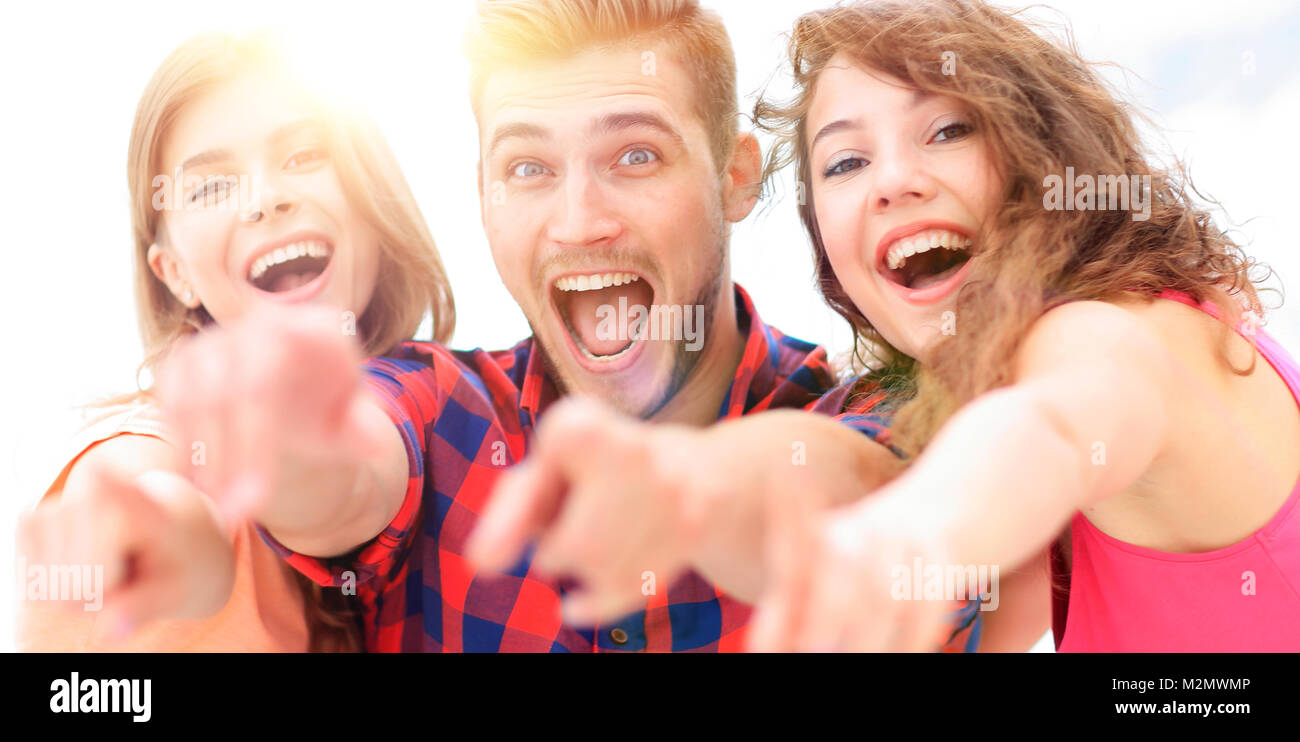 closeup of three young people showing hands forward. the concept of ...