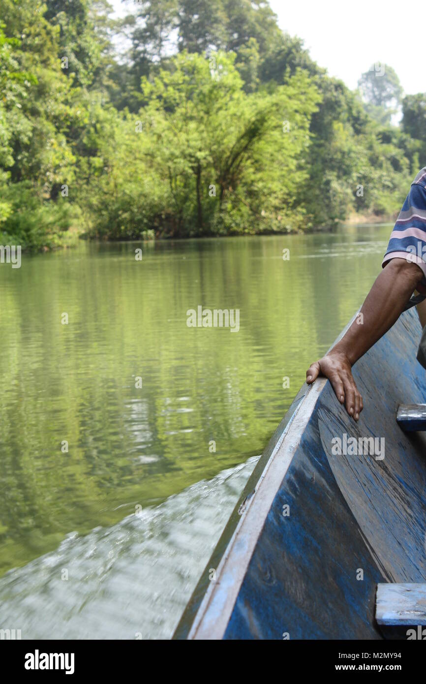 Hand resting on the rail of a small boat Stock Photo - Alamy