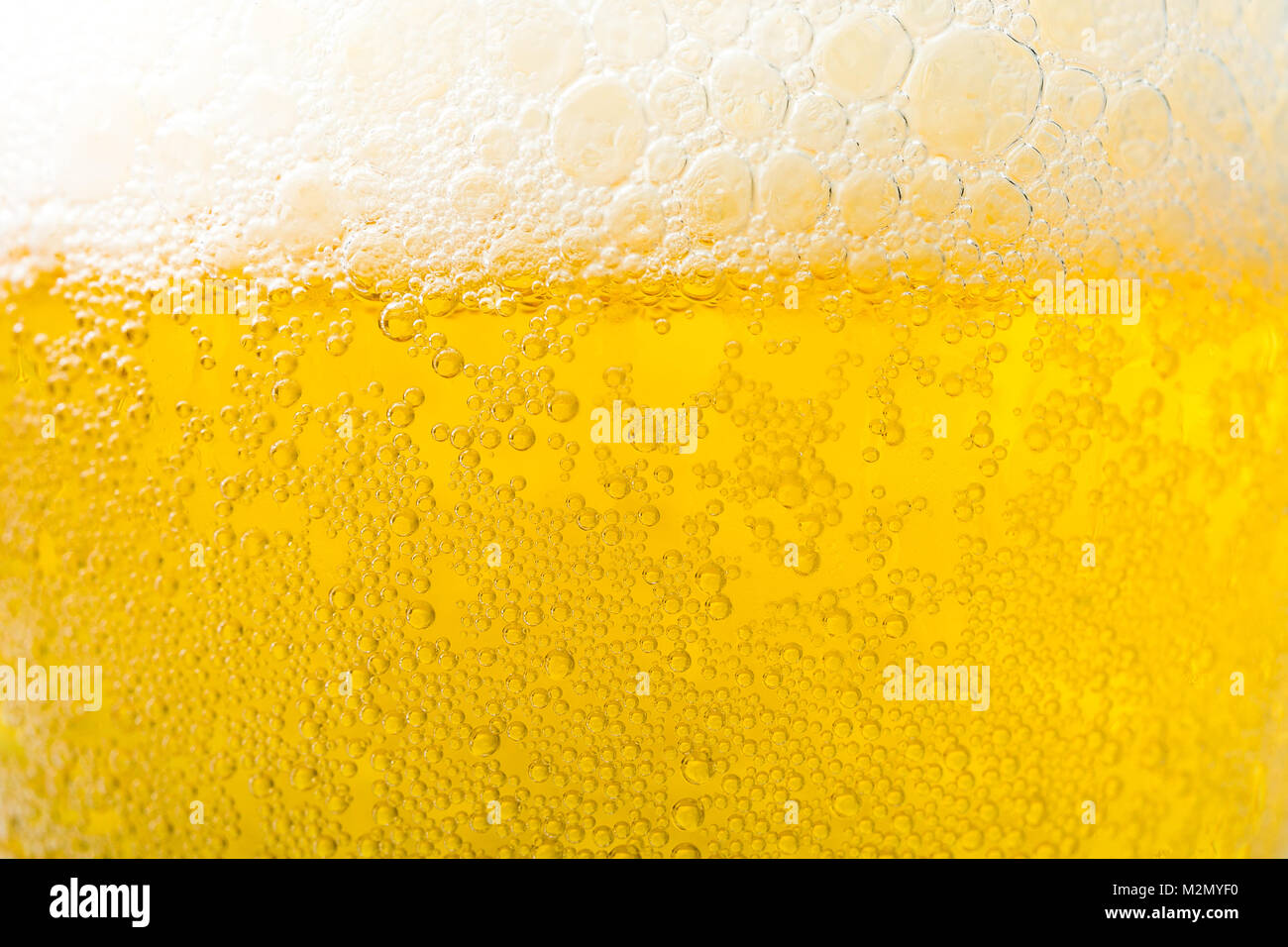 Background texture of frosty beer with foam and bubbles Stock Photo - Alamy