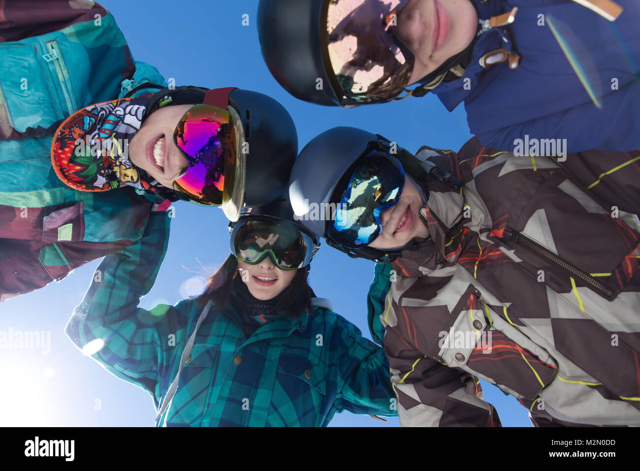 Young men and women outdoor skiing Stock Photo - Alamy