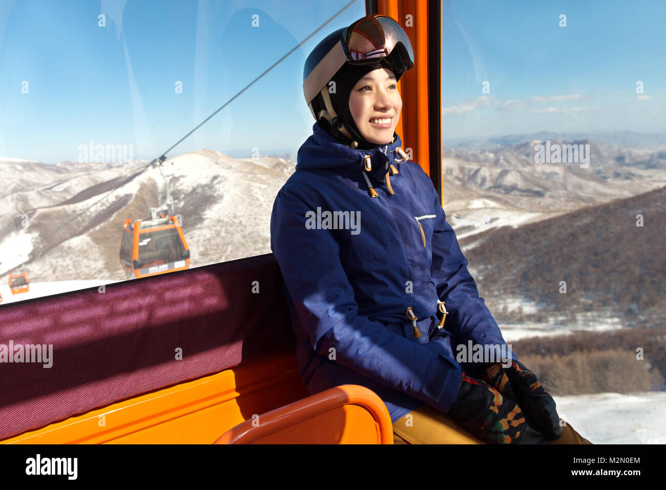 Young woman outdoor skiing Stock Photo - Alamy