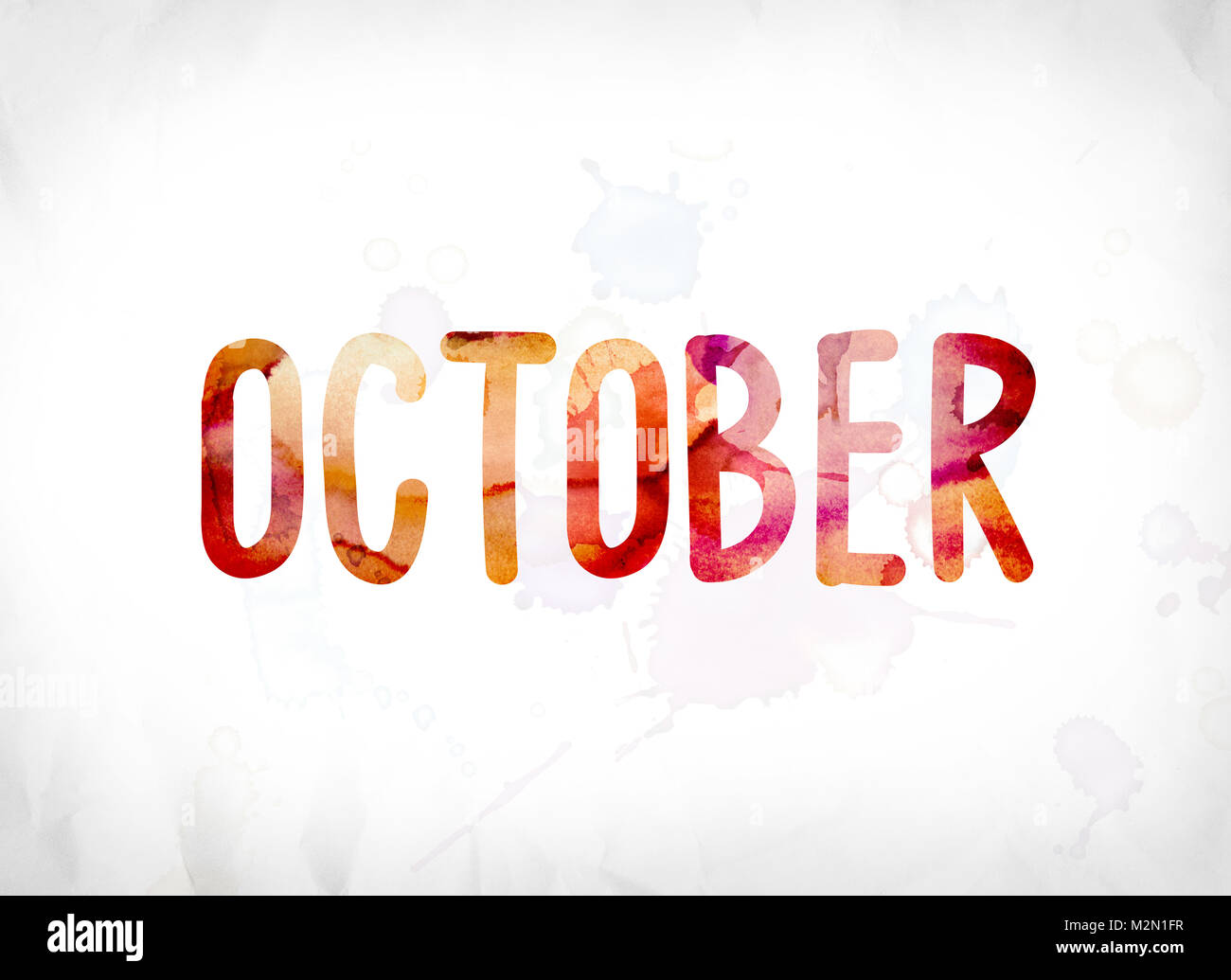 The word October concept and theme painted in colorful watercolors on a ...