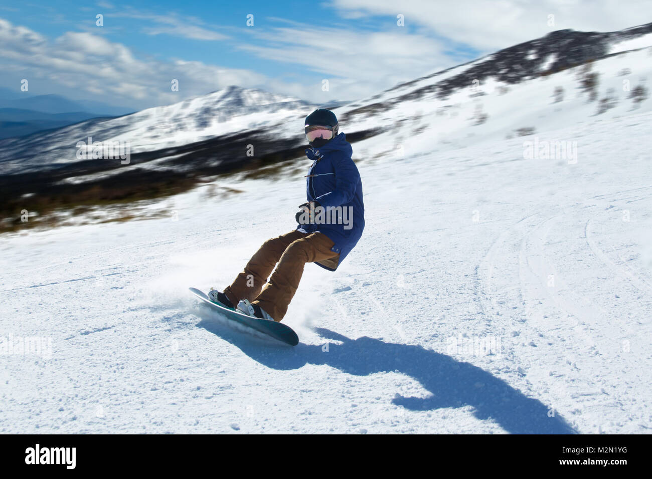 Young woman outdoor skiing Stock Photo - Alamy