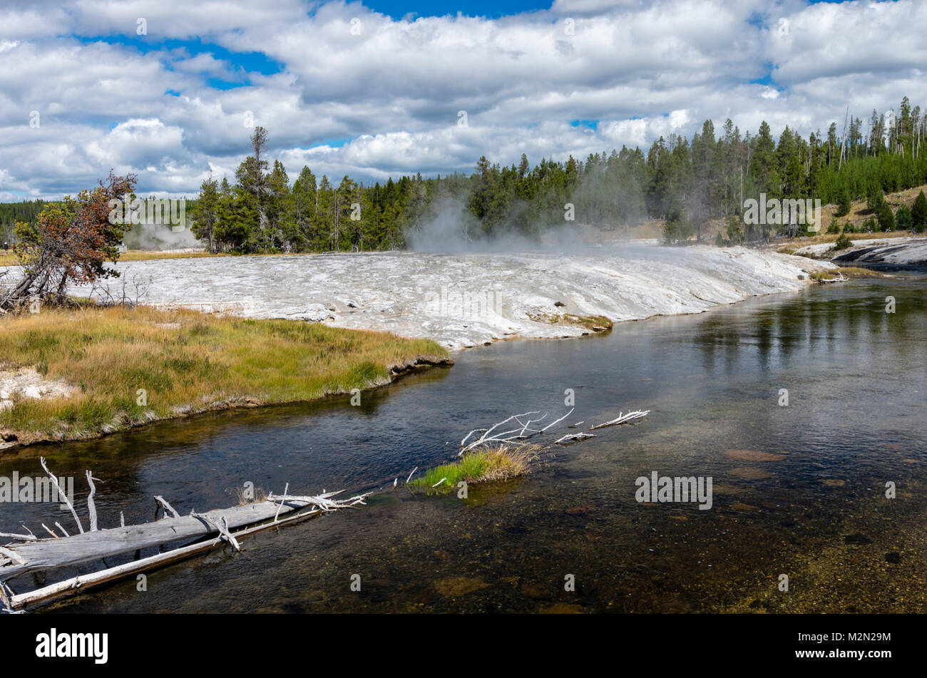 View of the Firehole River as it flows through the Old Faithful thermal ...