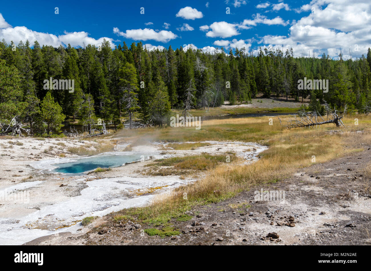 Grotto Fountain Geyser has a brilliant blue mineral color. Upper Geyser ...