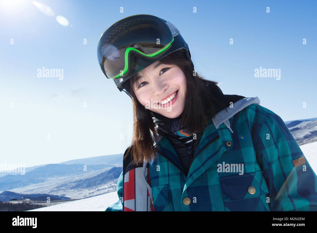 Young woman outdoor skiing Stock Photo - Alamy