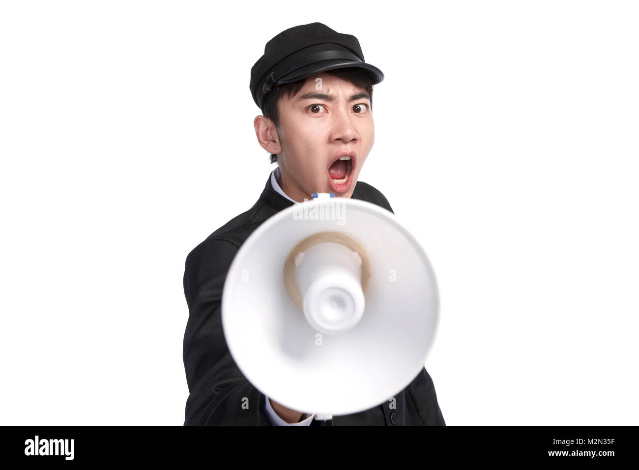 Restore ancient ways young man uses a bullhorn Stock Photo - Alamy