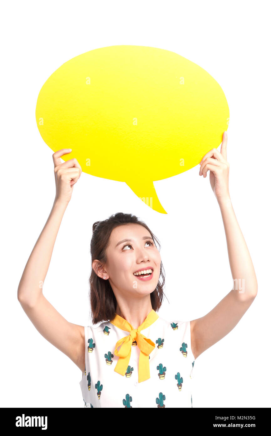 The fashionable young woman holding a dialog box Stock Photo - Alamy