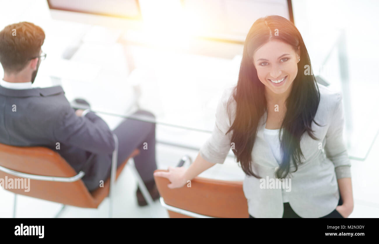 successful business woman standing near modern workplace Stock Photo ...