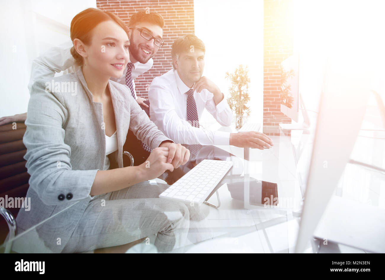 business team working in a computer room Stock Photo - Alamy