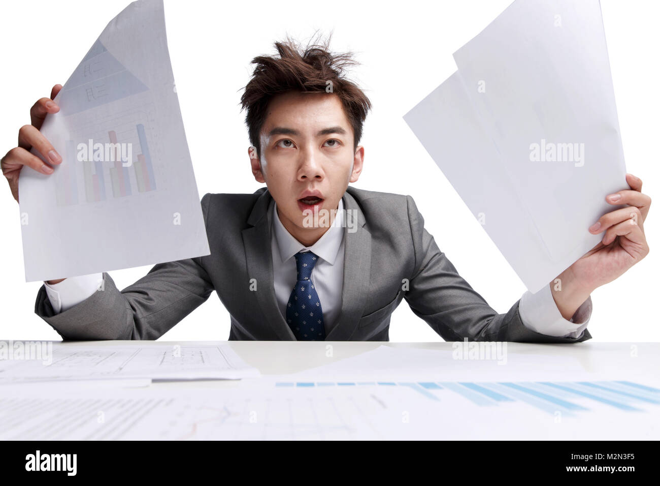 Dull looks young business man Stock Photo - Alamy