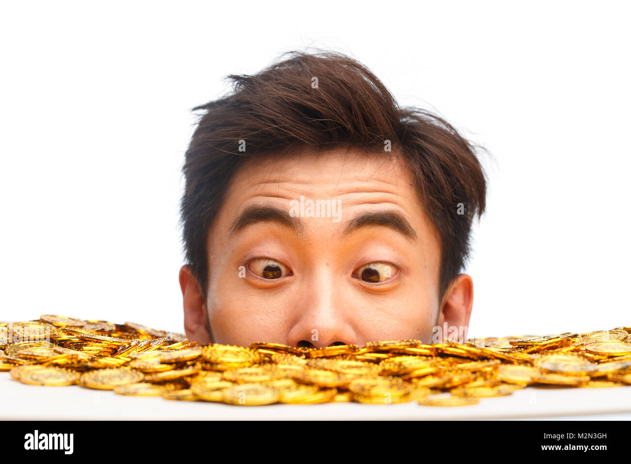 The youth man greedy Stock Photo - Alamy