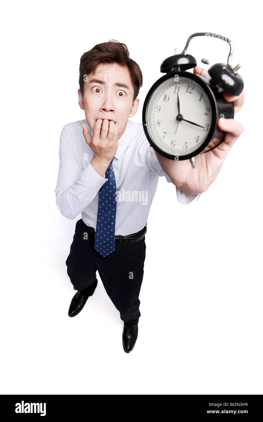 Young man covering face hands Cut Out Stock Images & Pictures - Alamy