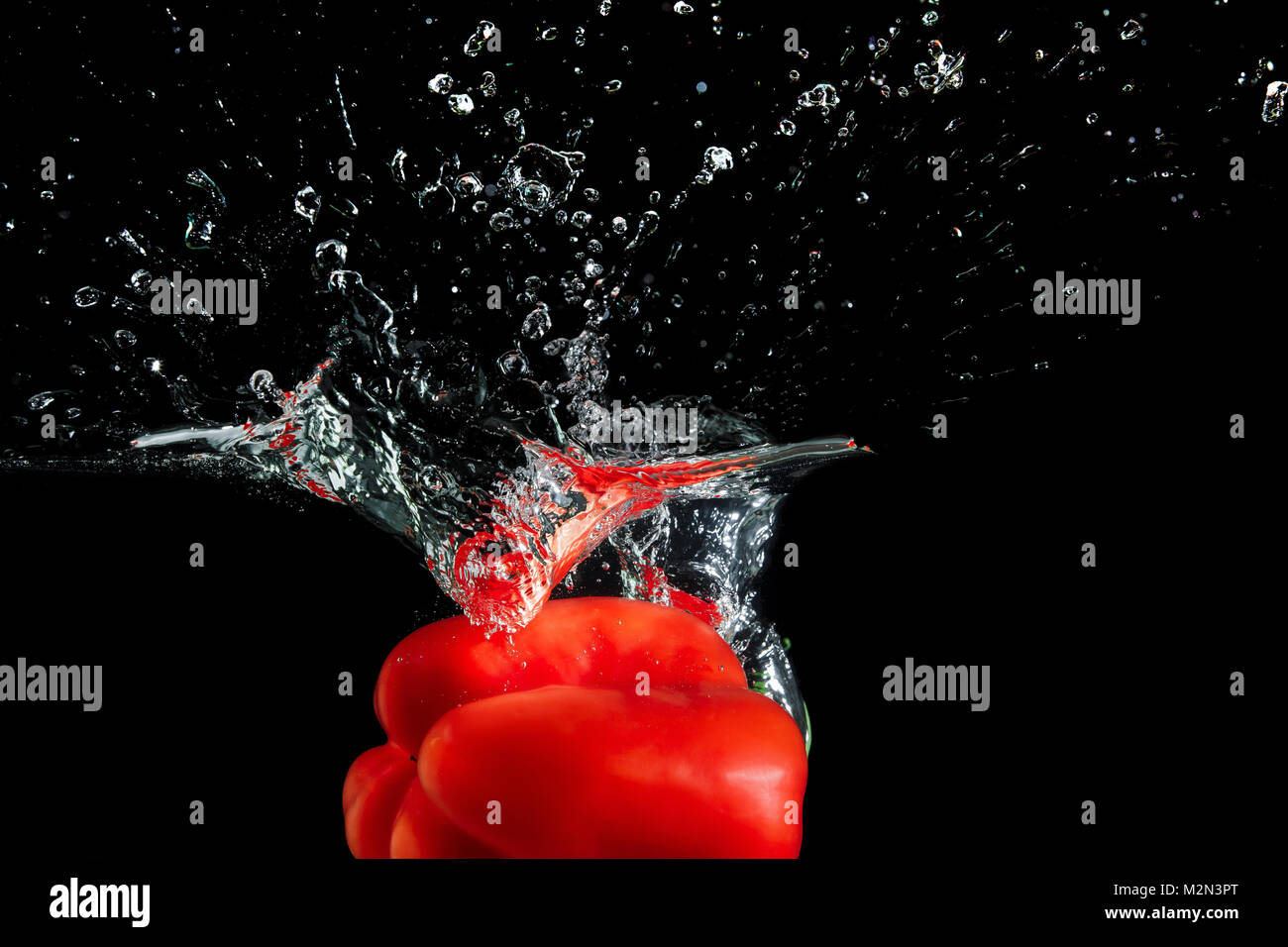 bell pepper in water with splash Stock Photo - Alamy