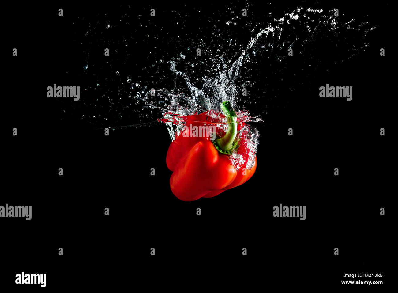 bell pepper in water with splash Stock Photo - Alamy