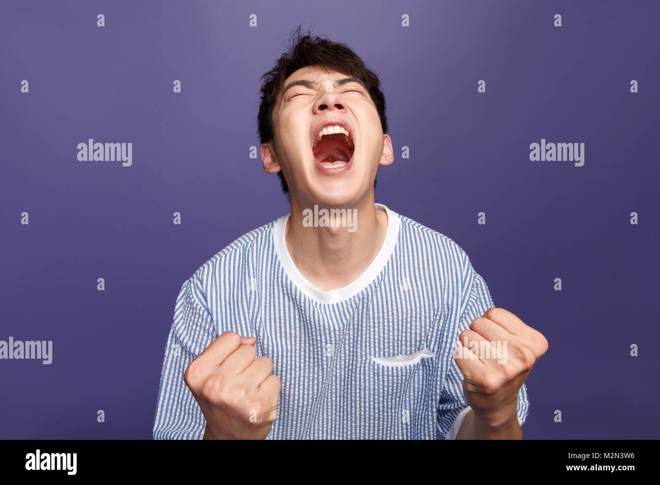 Crazy young man Stock Photo - Alamy