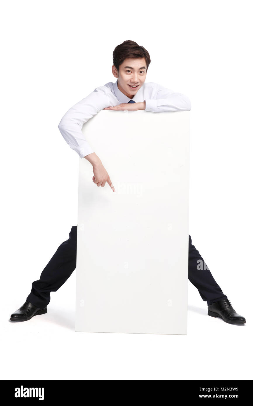 Business young man with a white board Stock Photo - Alamy