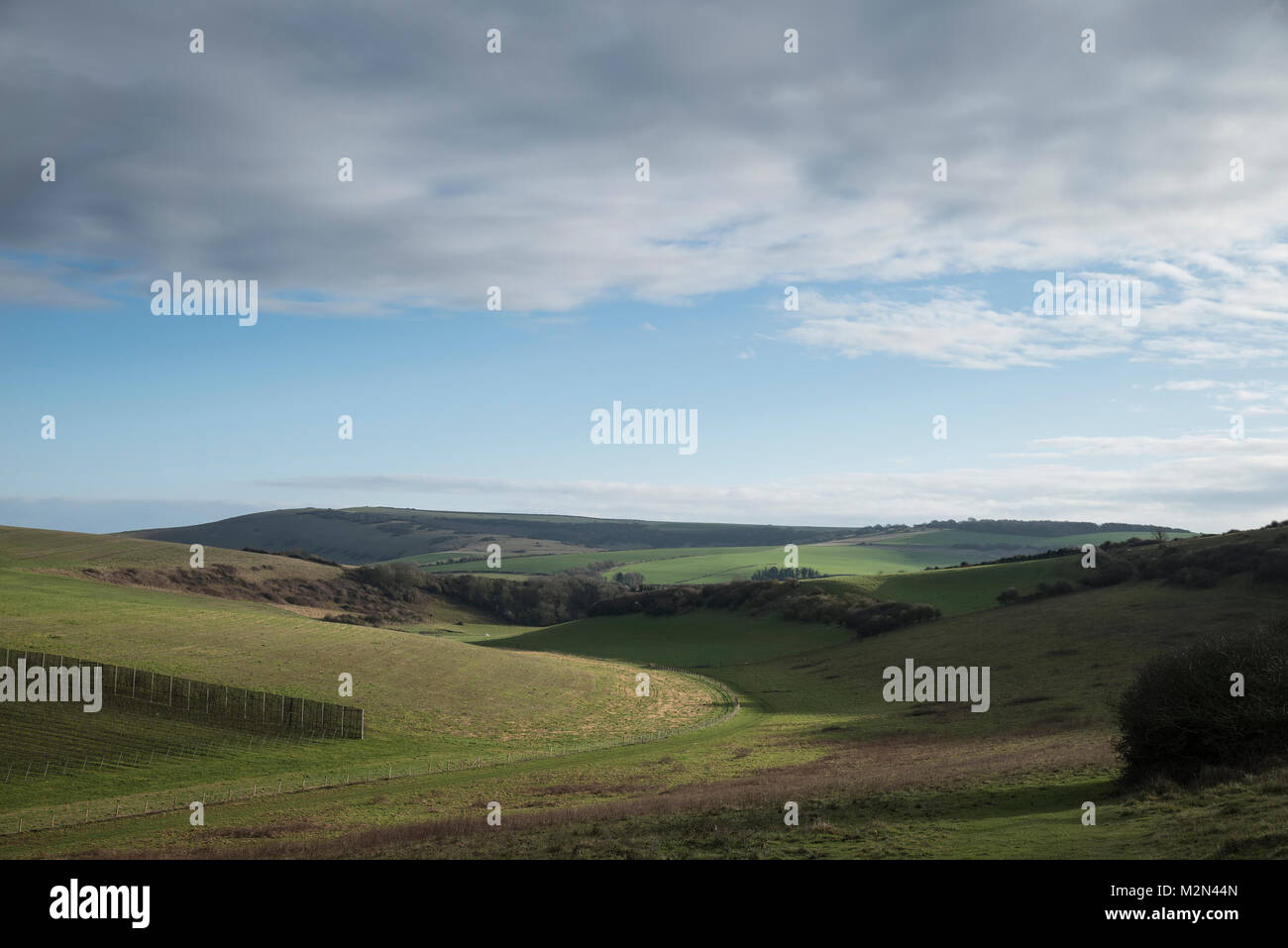 Beautiful English countryside landscape across rolling green hills ...