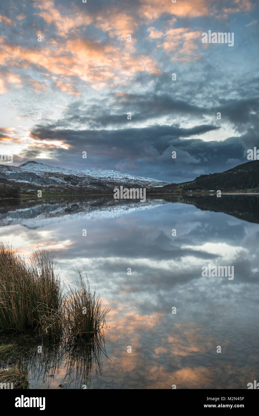 Beautiful sunrise landscape image in Winter of Llyn Cwellyn in ...