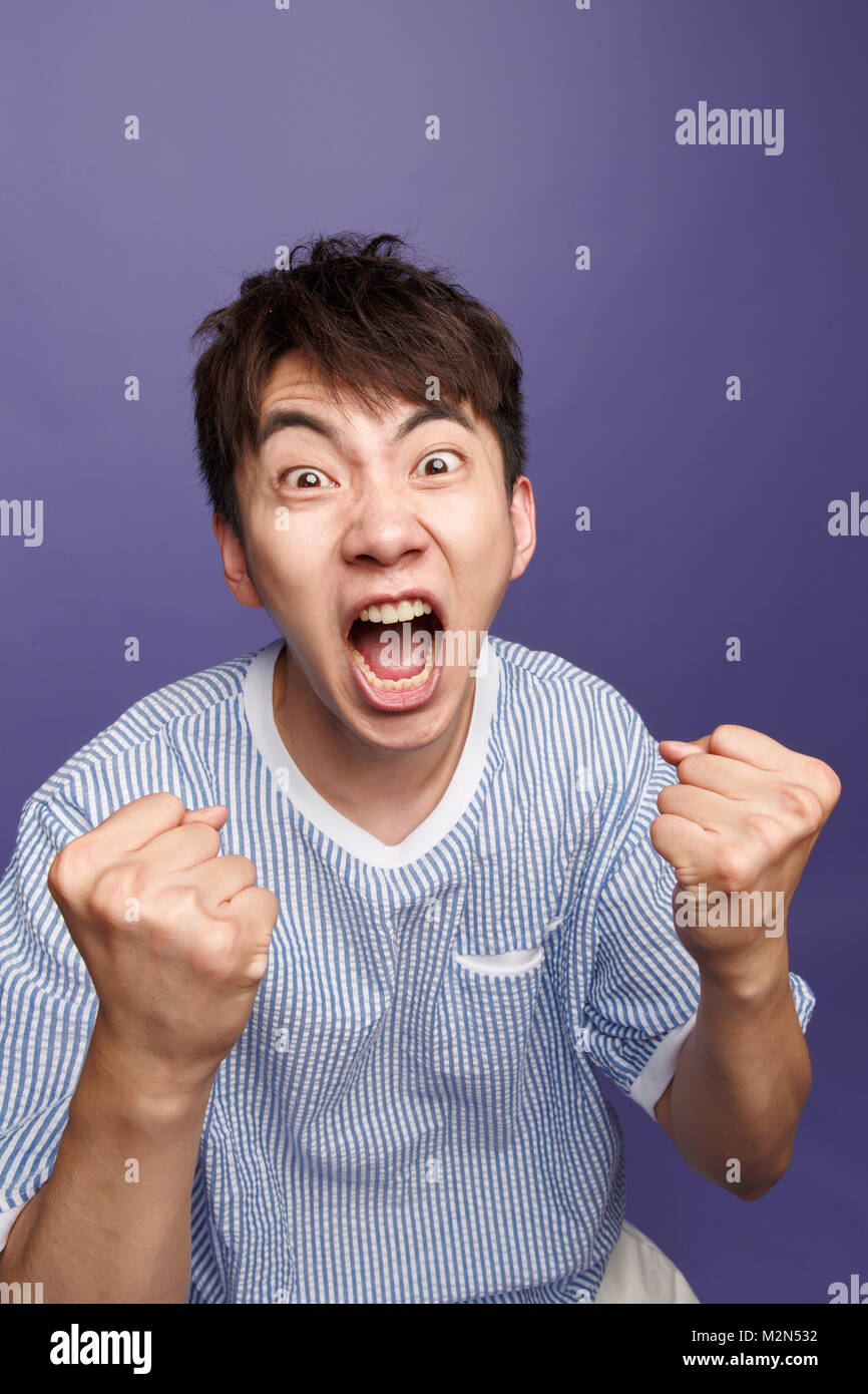 Crazy young man Stock Photo - Alamy