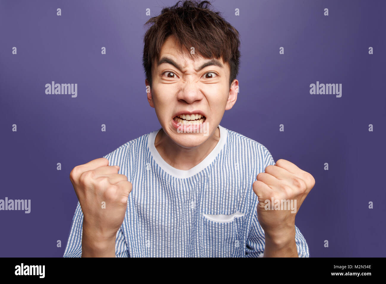 Crazy young man Stock Photo - Alamy