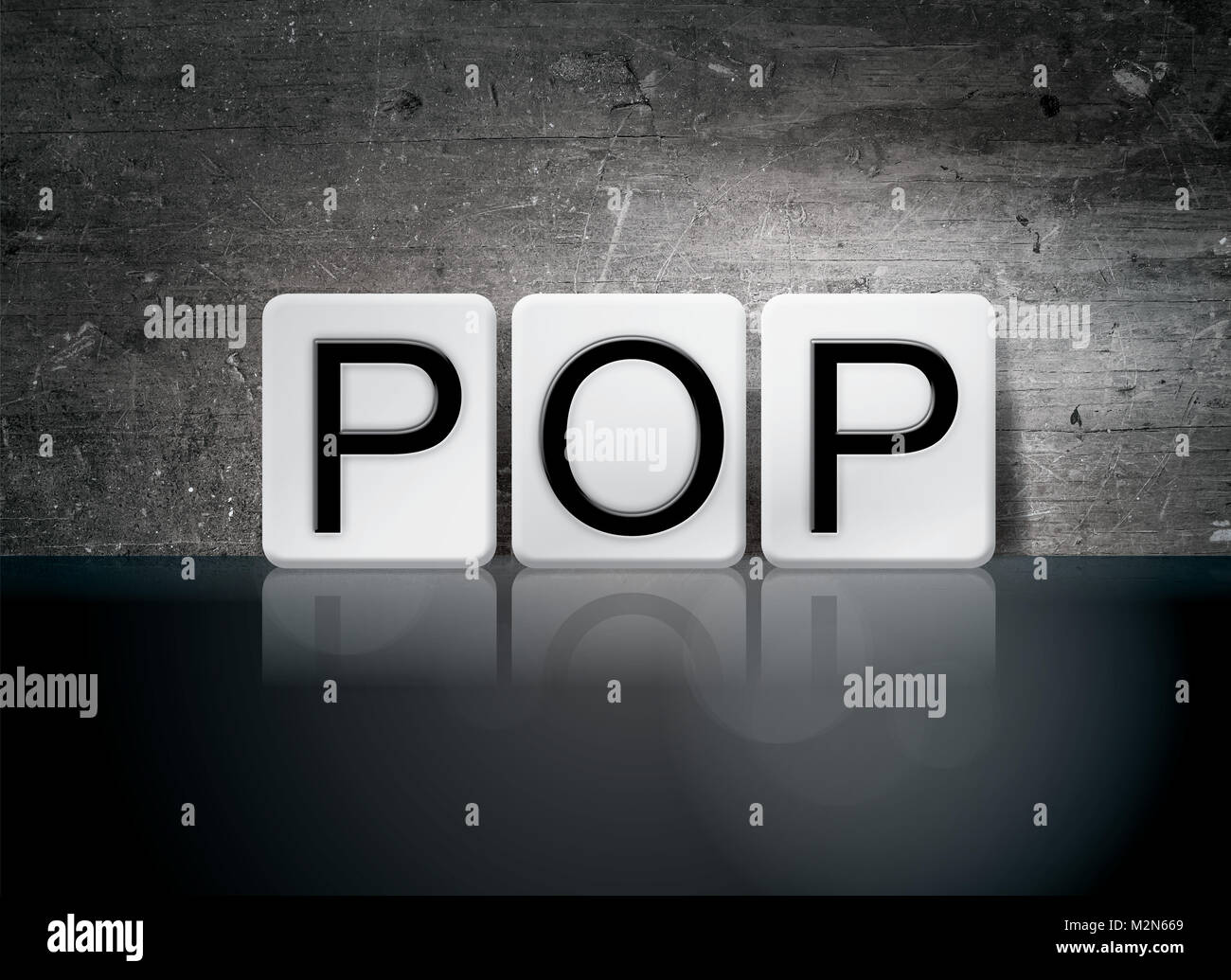 The word Pop concept and theme written in white tiles on a dark ...
