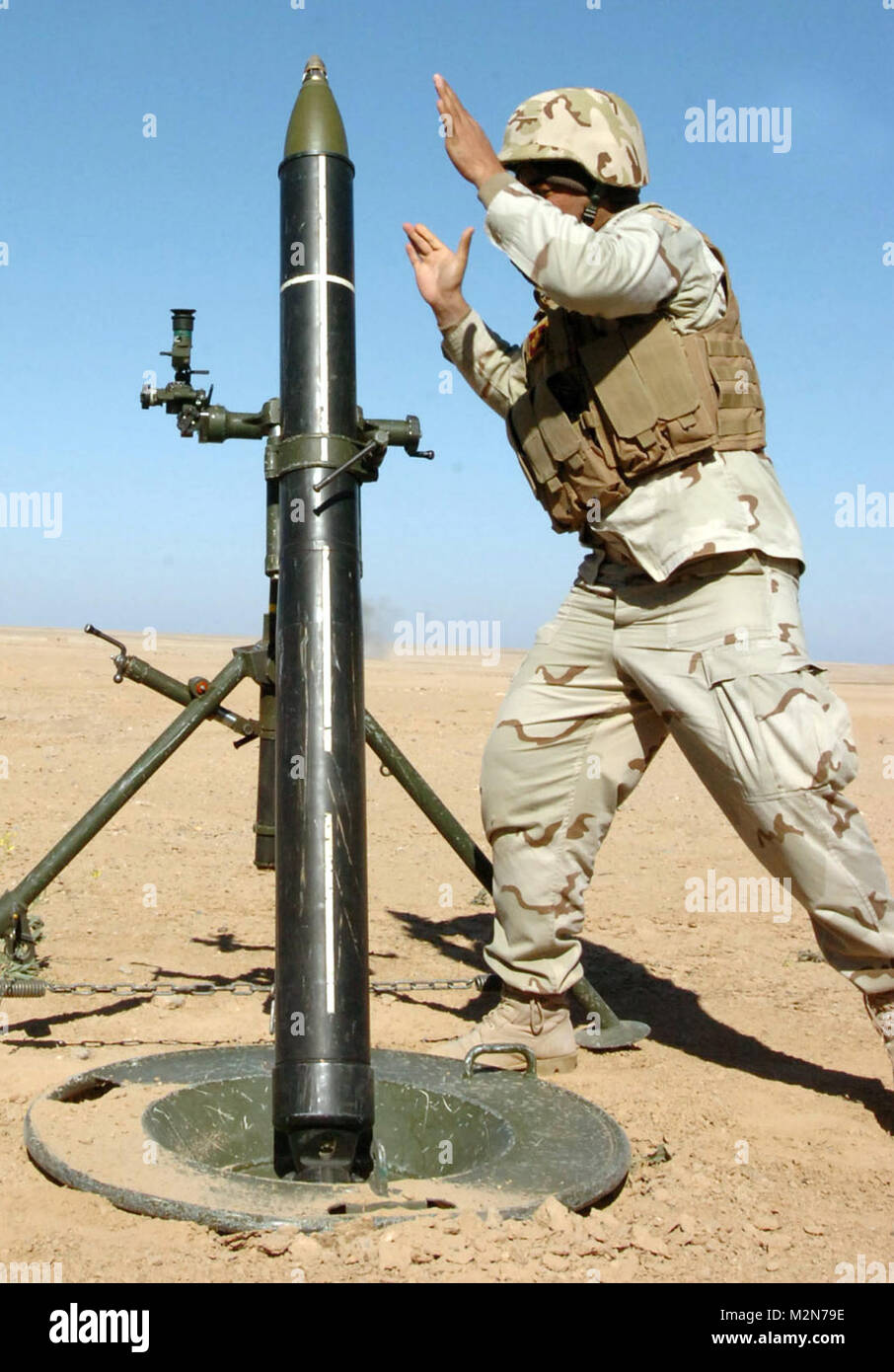 A mortarman with 1st Brigade, 1st Iraqi Army Division fires a live ...