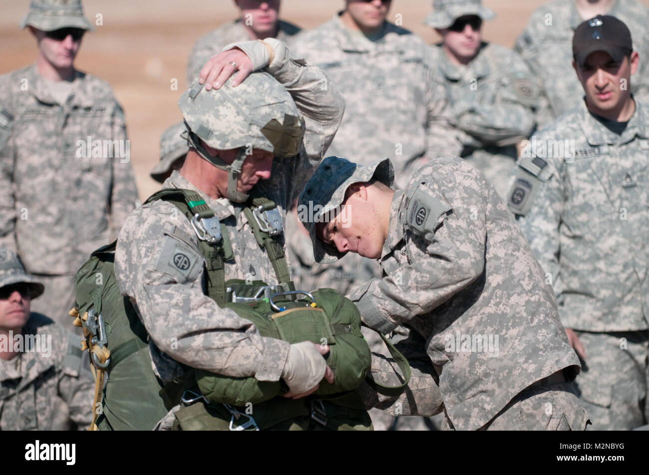 As “black hat” jumpmaster instructor Staff Sgt. Victor Vasquez watches ...
