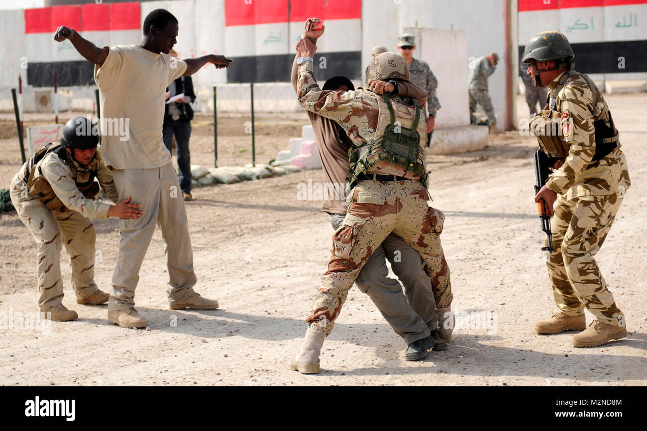 Tackling mock insurgent by 1st Armored Division and Fort Bliss Stock ...