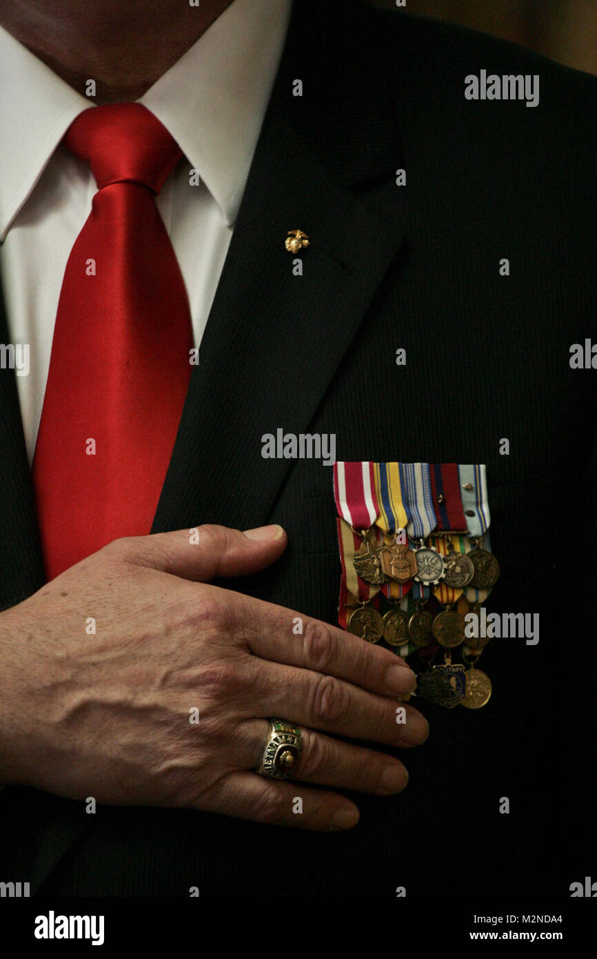STATEN ISLAND, N.Y. -- A Marine veteran places his hand over his heart ...