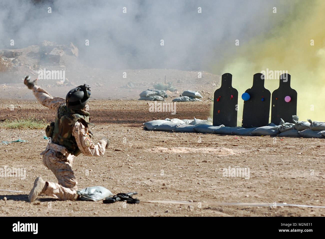 Throwing a smoke grenade by 1st Armored Division and Fort Bliss Stock ...