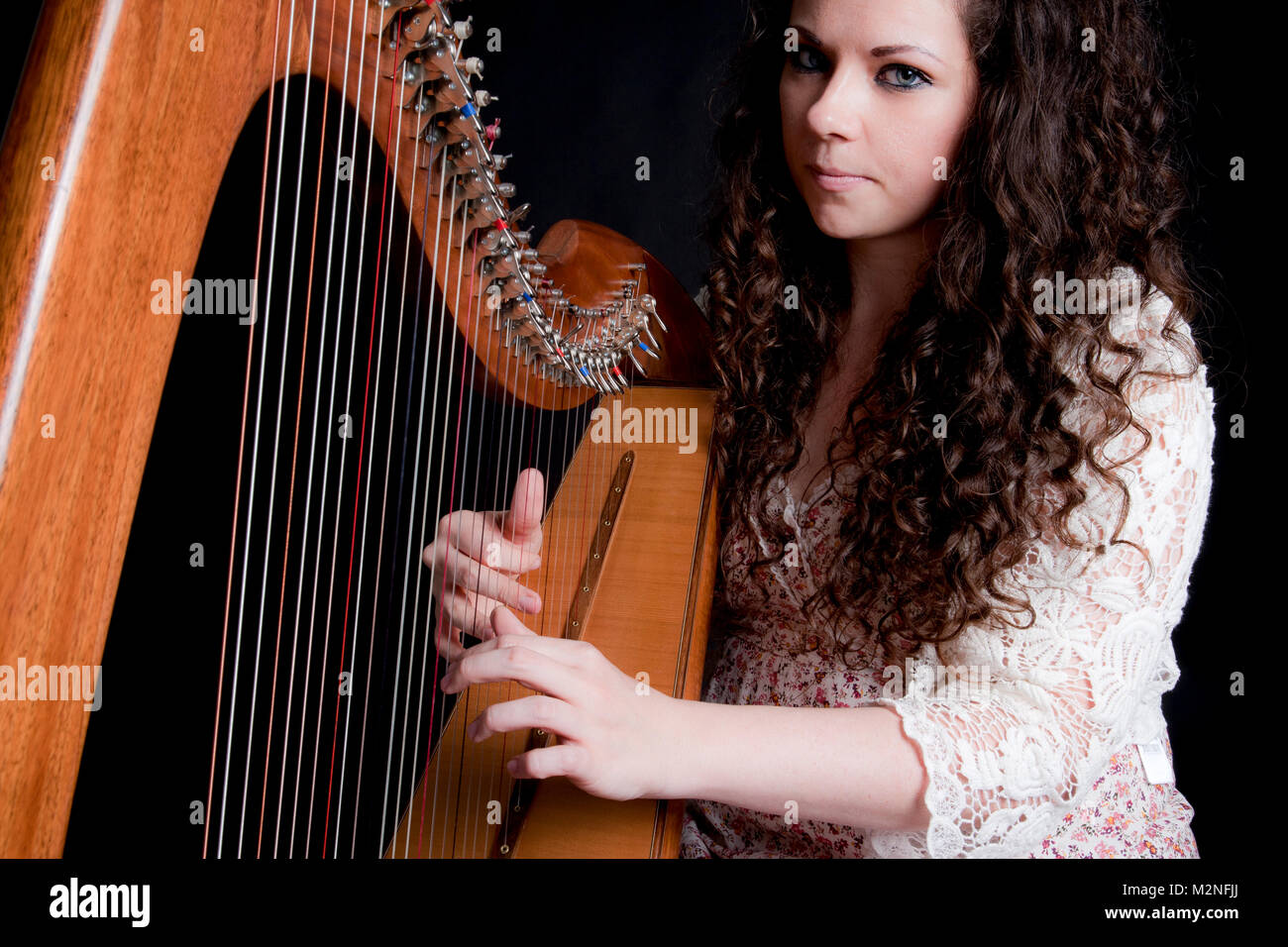 Irish Harpist Michelle Mulcahy playing the harp Stock Photo - Alamy