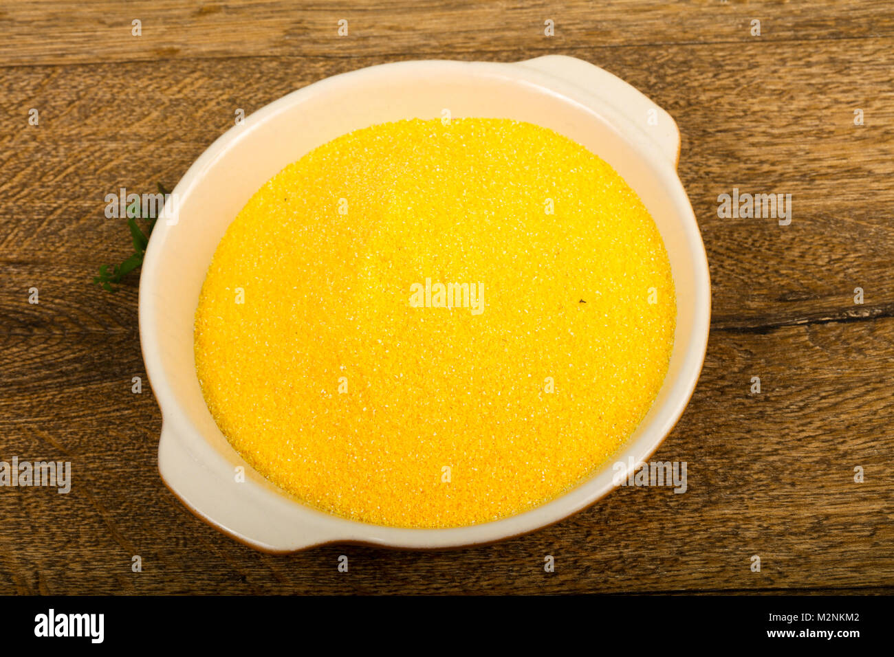 Raw polenta ready for cooking Stock Photo - Alamy