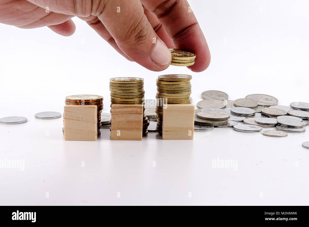BUSINESS CONCEPT: Coins and wooden plate Stock Photo - Alamy