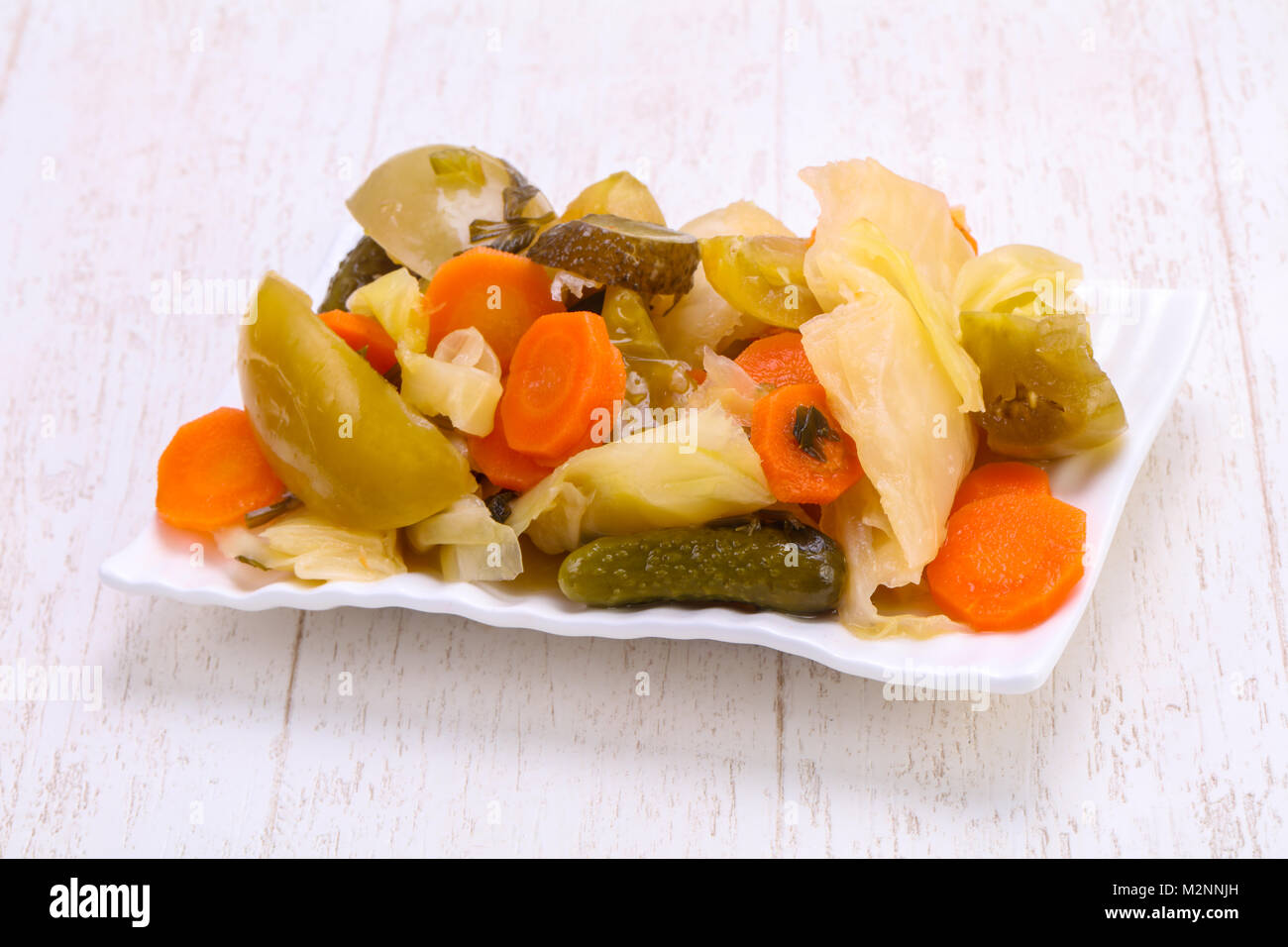 Pickled vegetables mix in the bowl Stock Photo - Alamy