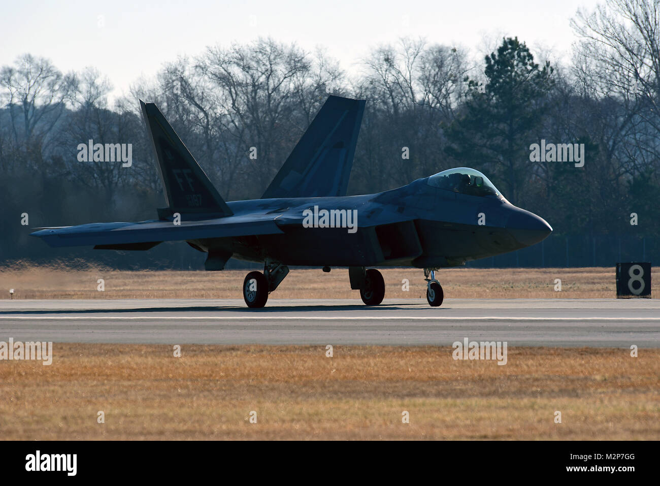 An F-22 Raptor from the Air Combat Command F-22 Demonstration Team at ...