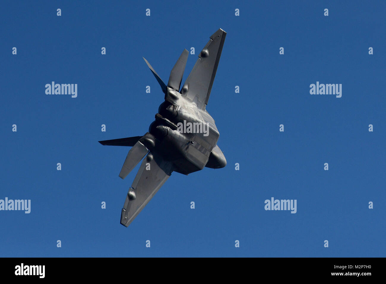 An F-22 Raptor from the Air Combat Command F-22 Demonstration Team at ...