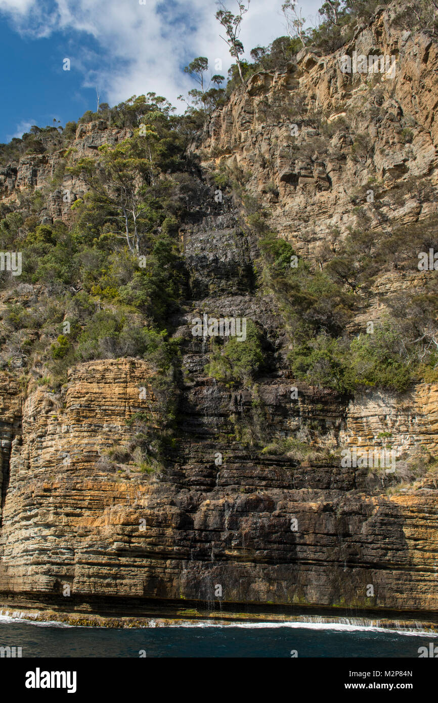Waterfall in Waterfall Bay, Tasman NP, Tasmania, Australia Stock Photo ...