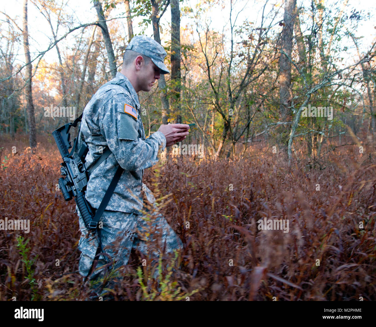 A member of the Oklahoma Army National Guard maintains his direction ...