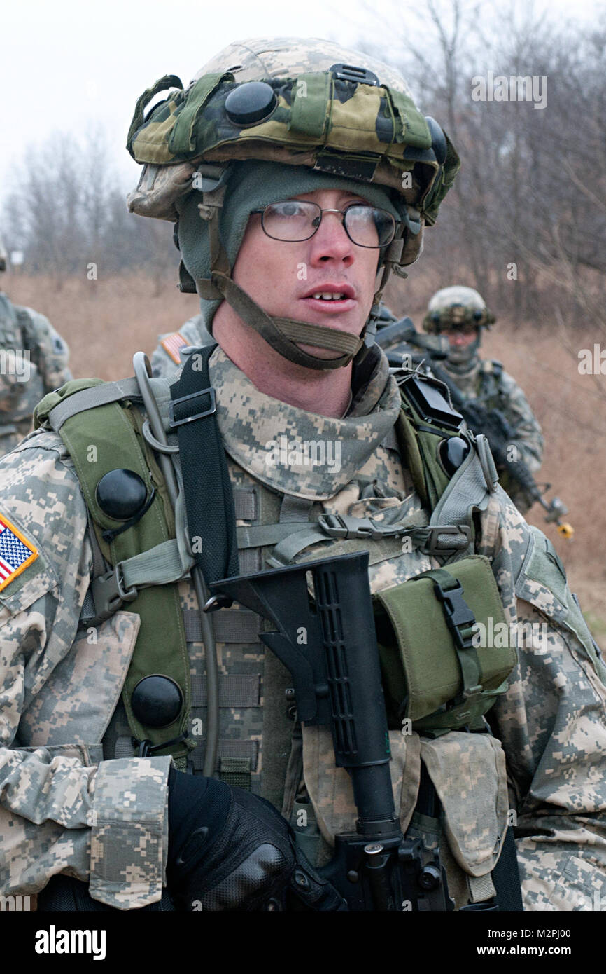 Spc. Ryan Vermillion, of Watonga, Okla., prepares to enter a mock ...