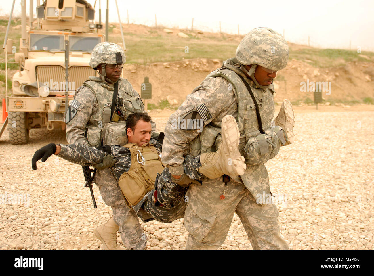 Buddy carry. CONTINGENCY OPERATING SITE MAREZ, Iraq – Pfc. Luther ...