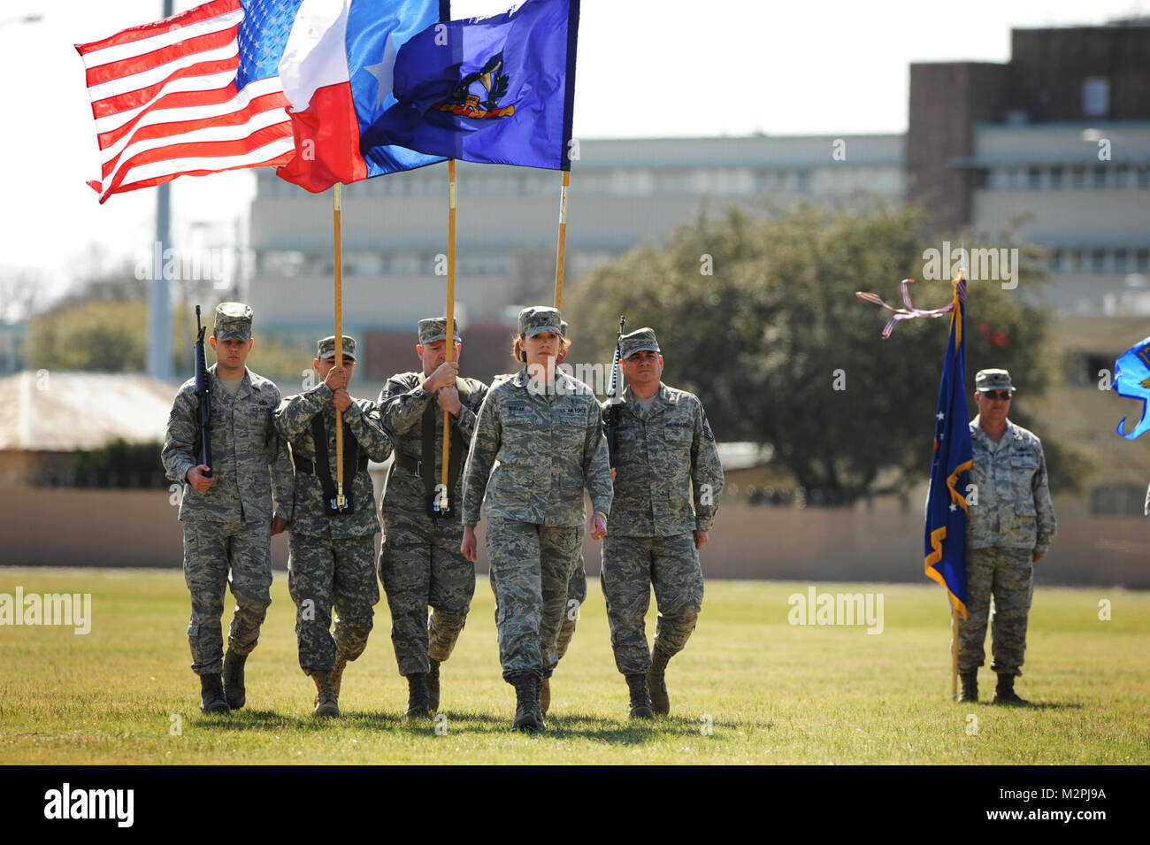 Chief of the Joint Staff, Colonel Connie McNabb, leads the honor guard ...