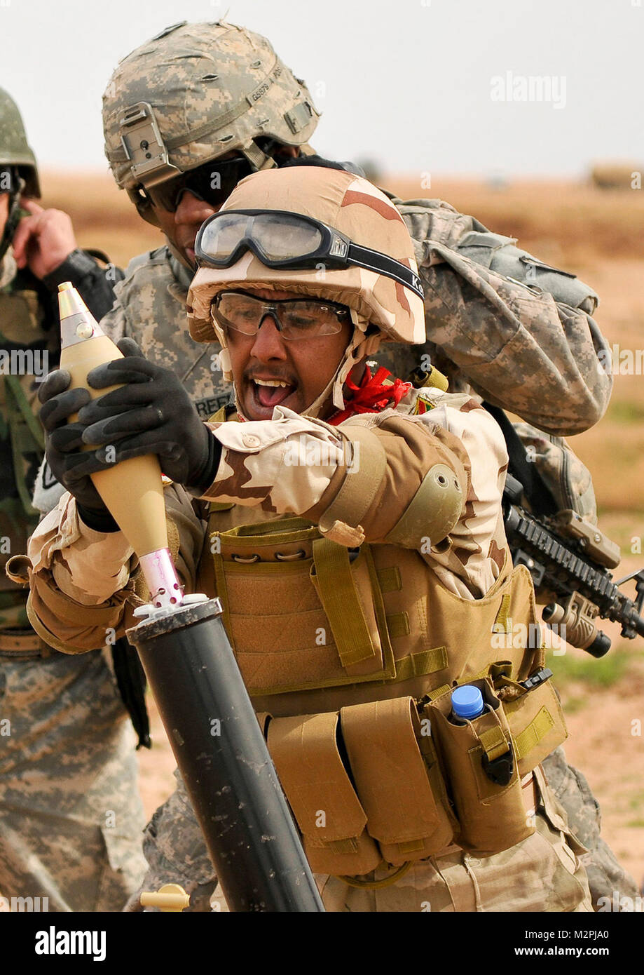 Fire! KIRKUSH MILITARY TRAINING BASE, Iraq – Iraqi Army Pfc. Abed-Hadi ...