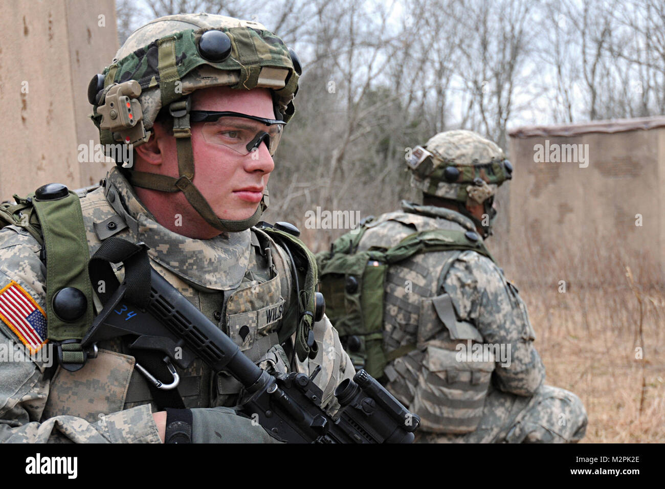 Spc. Matthew L. Wilson, of Okmulgee, Okla., pulls security during a ...